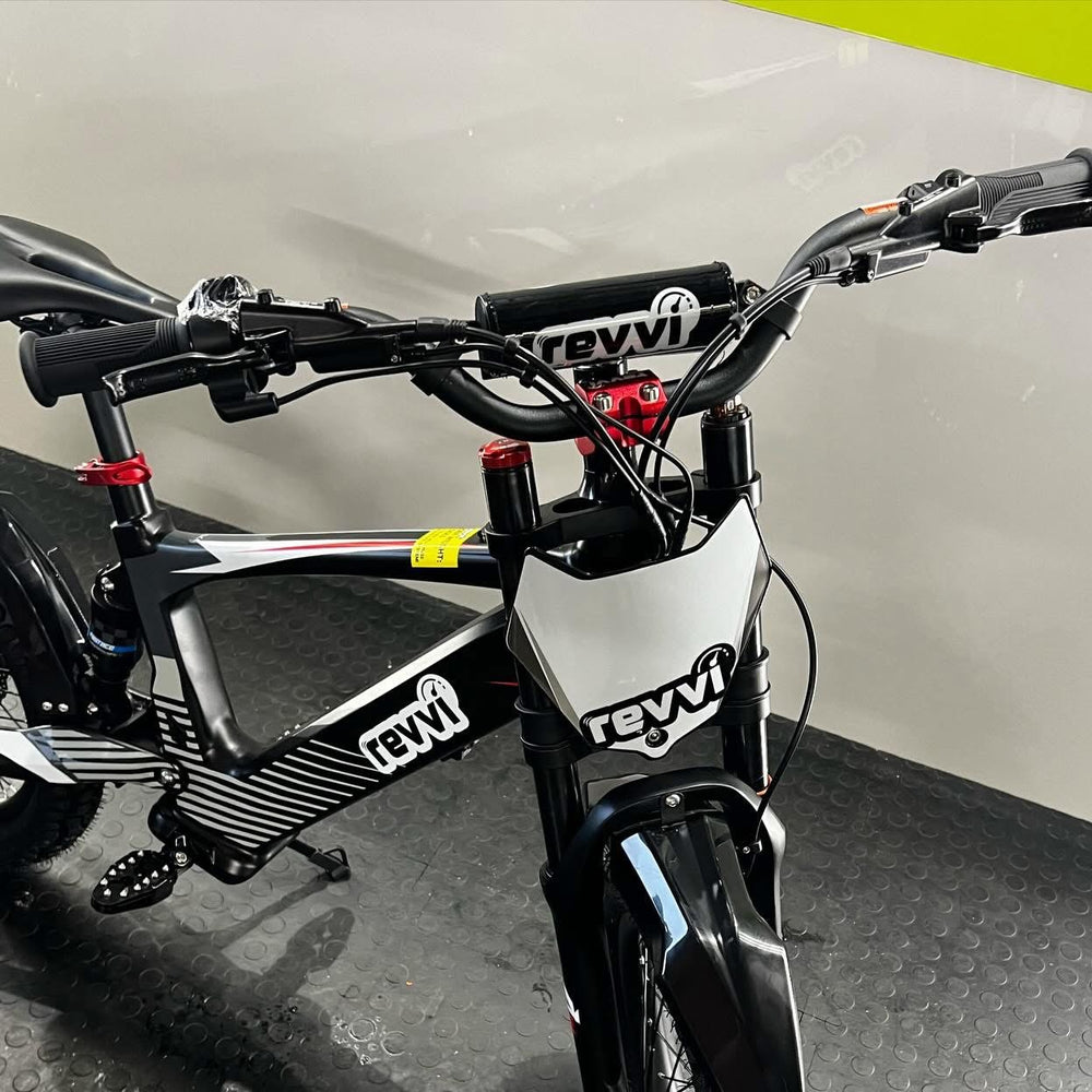 Revvi 18" Electric Kids Bike Black - In stock now – Garland Powersports